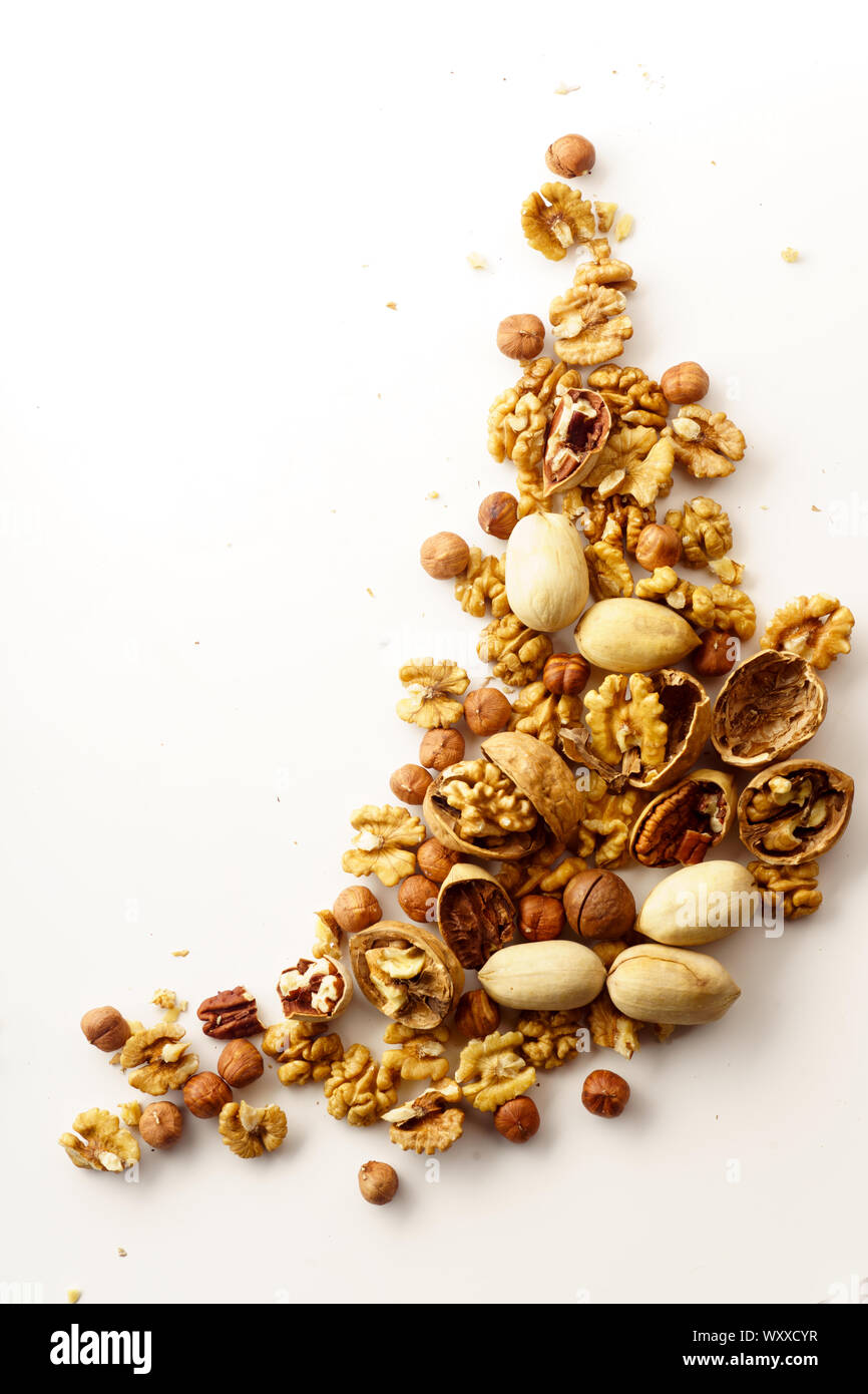 Overhead image of a group of various nuts with nutshells isolated on ...