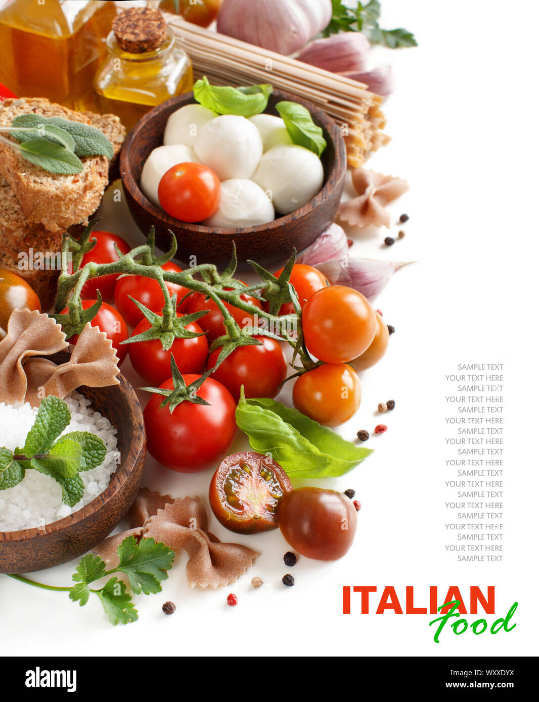 Italian cooking ingridients : mozzarella, tomatoes, garlic, herbs ...
