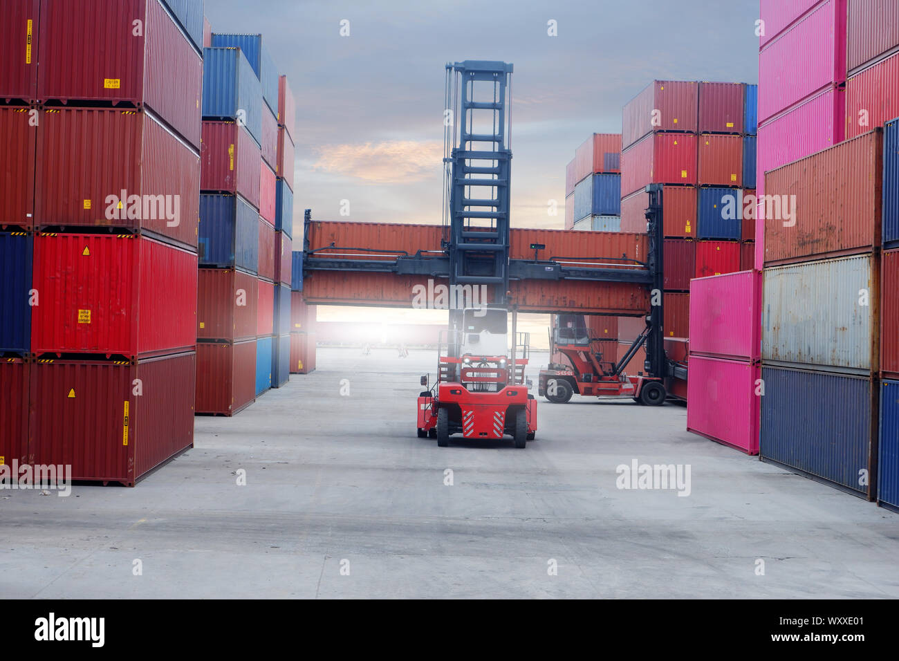 Industrial container yard with forklifts that work in shipyards to ...