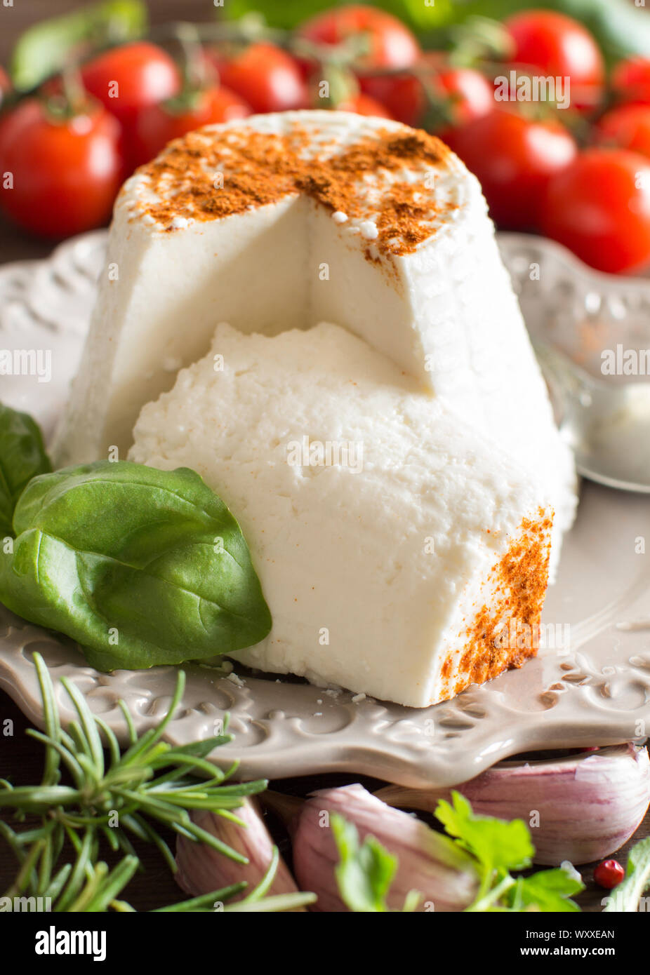 Italian ricotta cheese, vegetables and herbs close up Stock Photo - Alamy