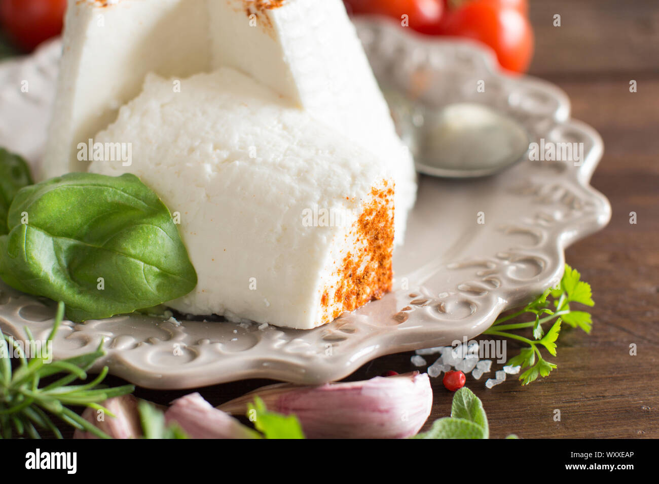 Italian ricotta cheese, vegetables and herbs close up Stock Photo - Alamy