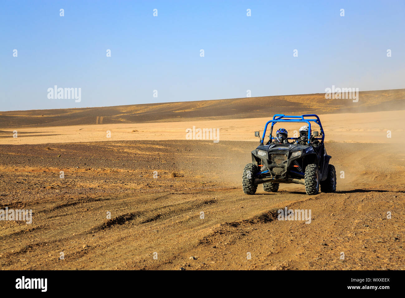 off road car with it's pilot in Morocco desert near Merzouga Stock ...