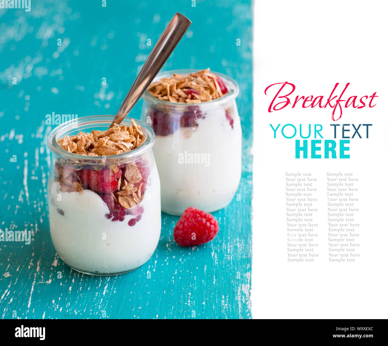 Raspberries, flakes and fresh yogurt in a jar Stock Photo - Alamy
