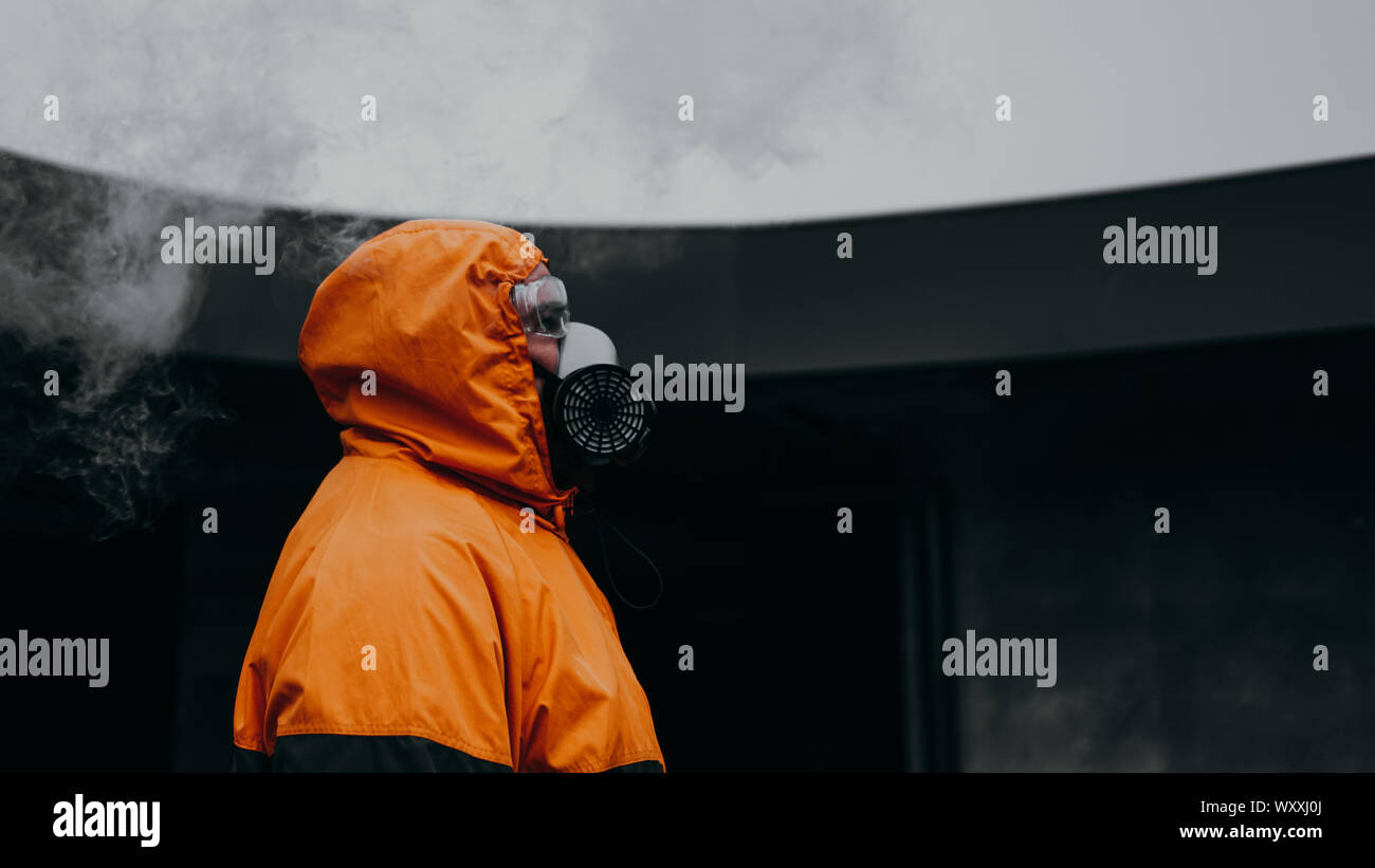 Protection respirator half mask for toxic gas.The man prepare to wear ...