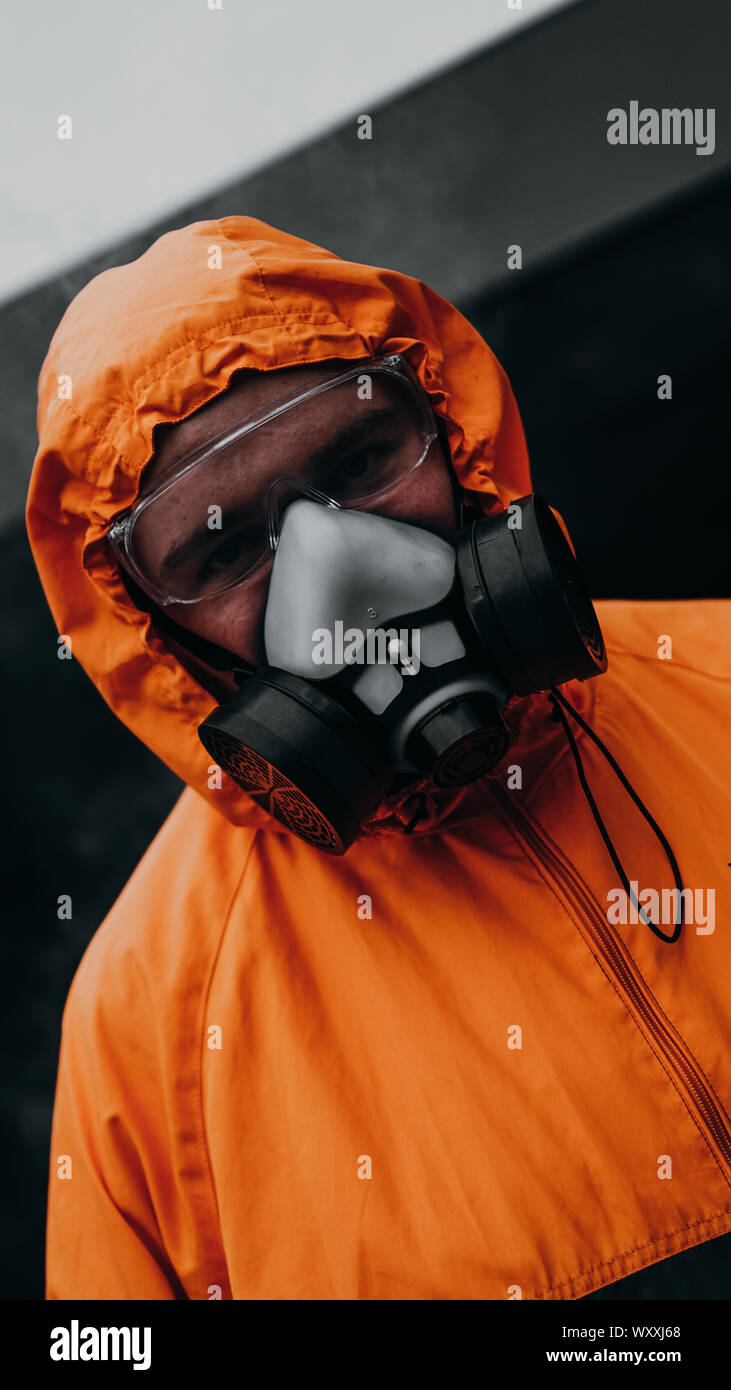 Protection respirator half mask for toxic gas.The man prepare to wear ...