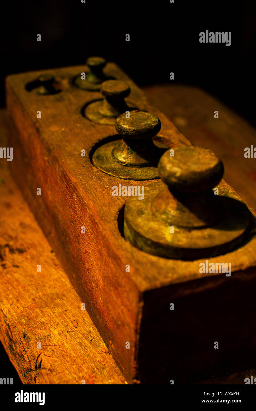 Old brass weights vintage retro Stock Photo - Alamy