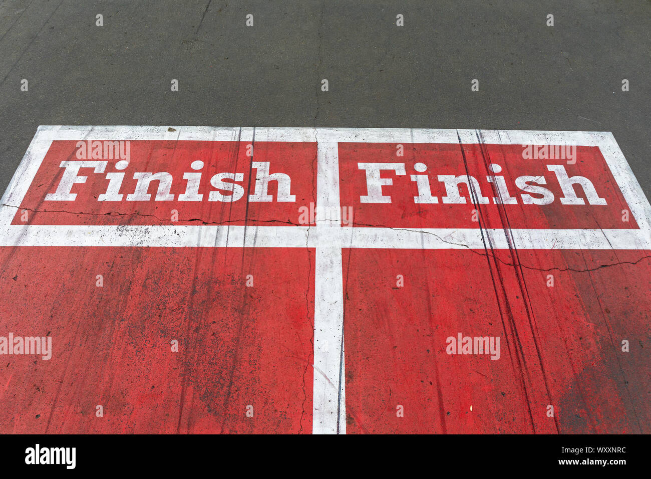 Double Finish Line at Red Running Sports Track Stock Photo - Alamy