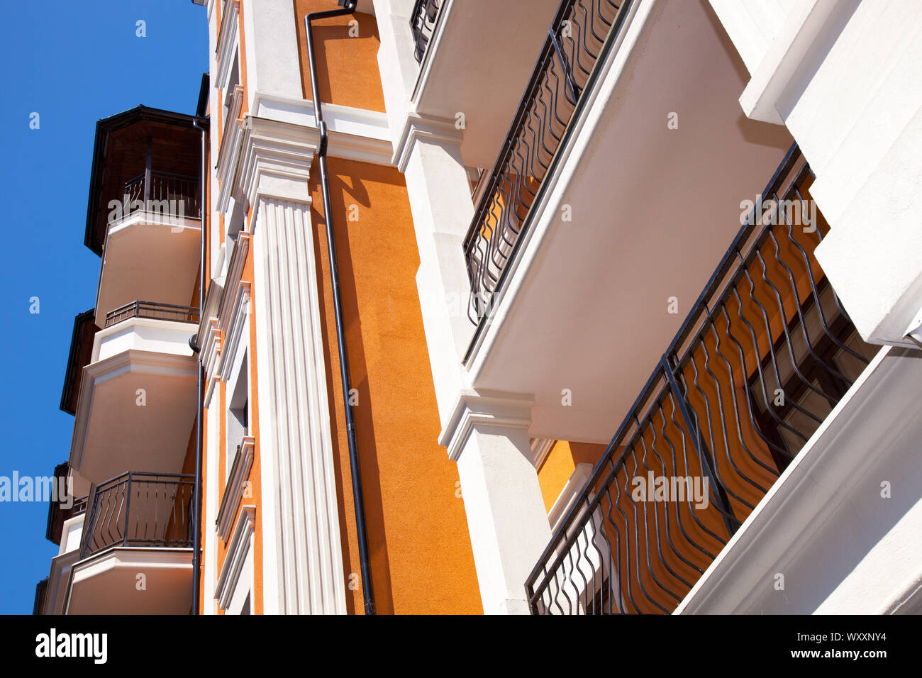 Modern orange apartment building hi-res stock photography and images ...