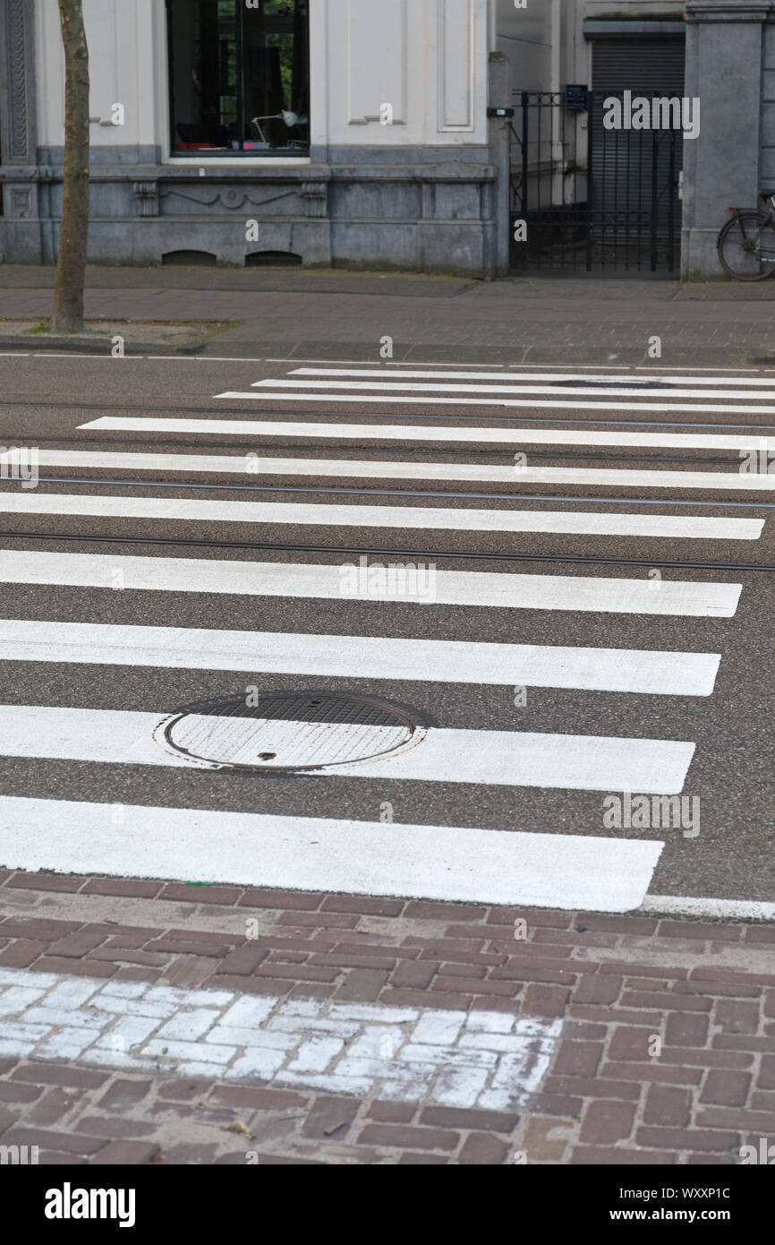 White Lines at Pedestrian Street Crosswalk in City Stock Photo - Alamy