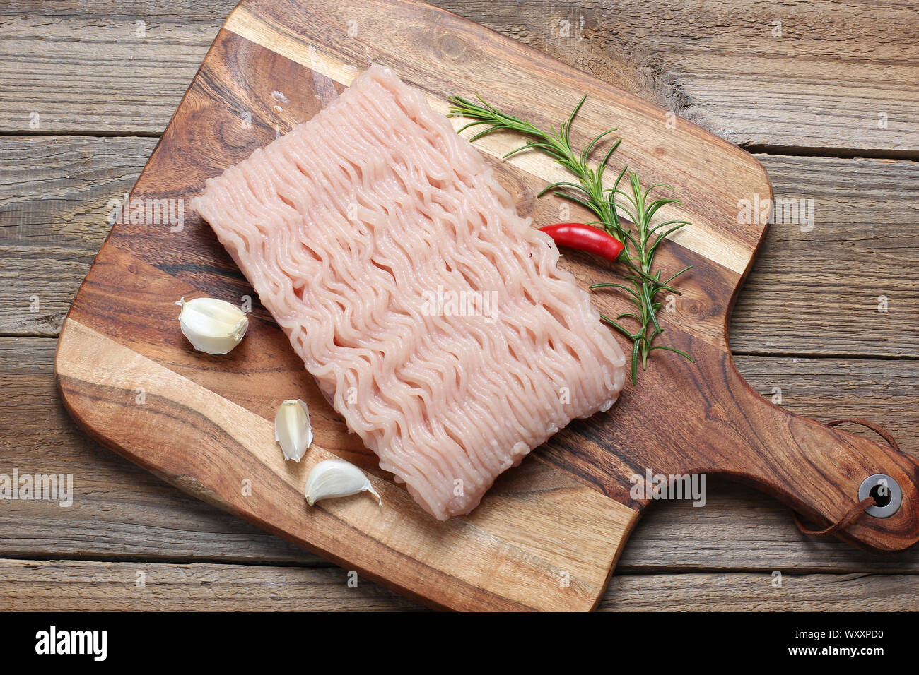 Minced Chicken Meat on Chopping Board Stock Photo - Alamy