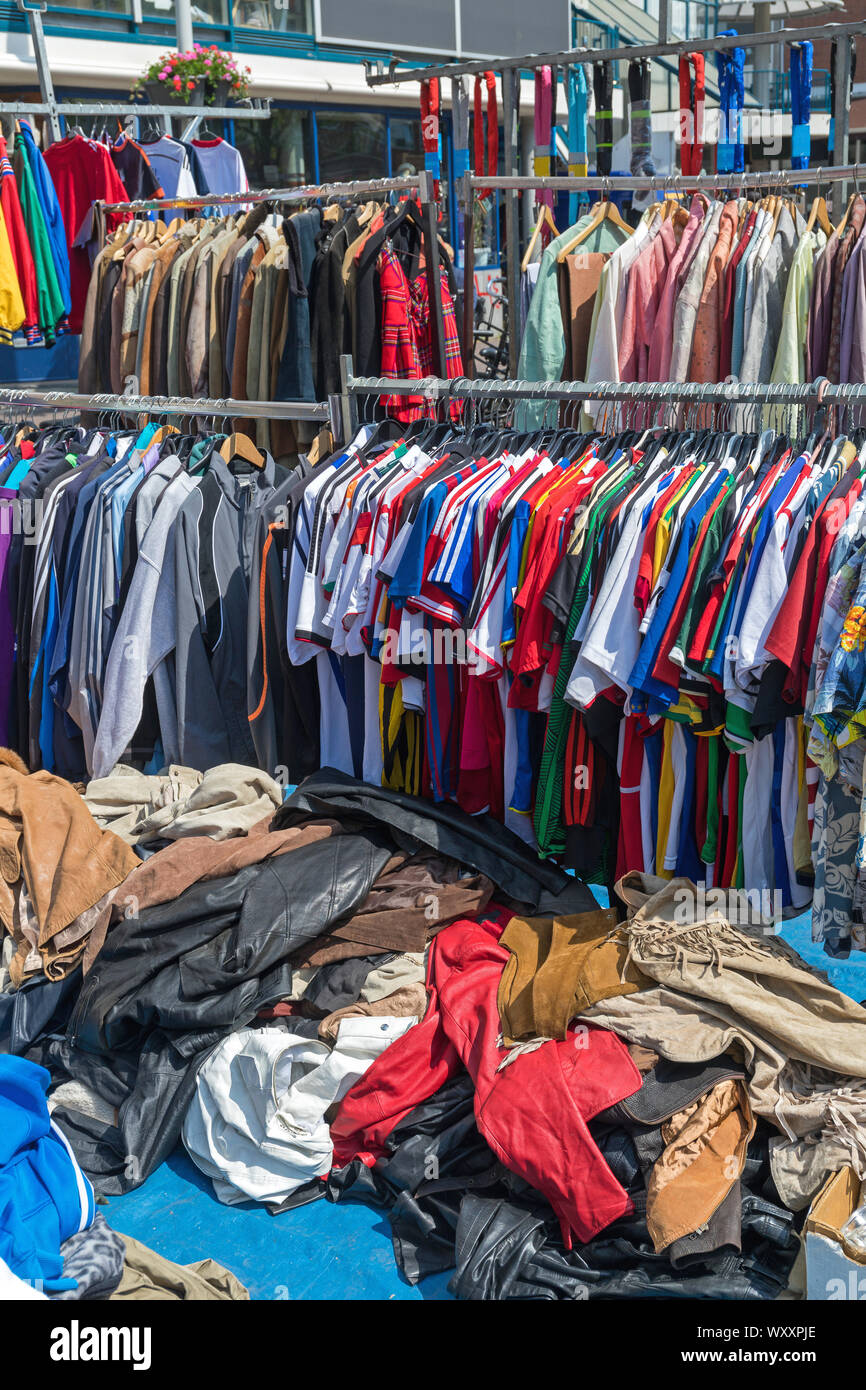 Stall With Used Clothing Garment at Flea Market Stock Photo - Alamy