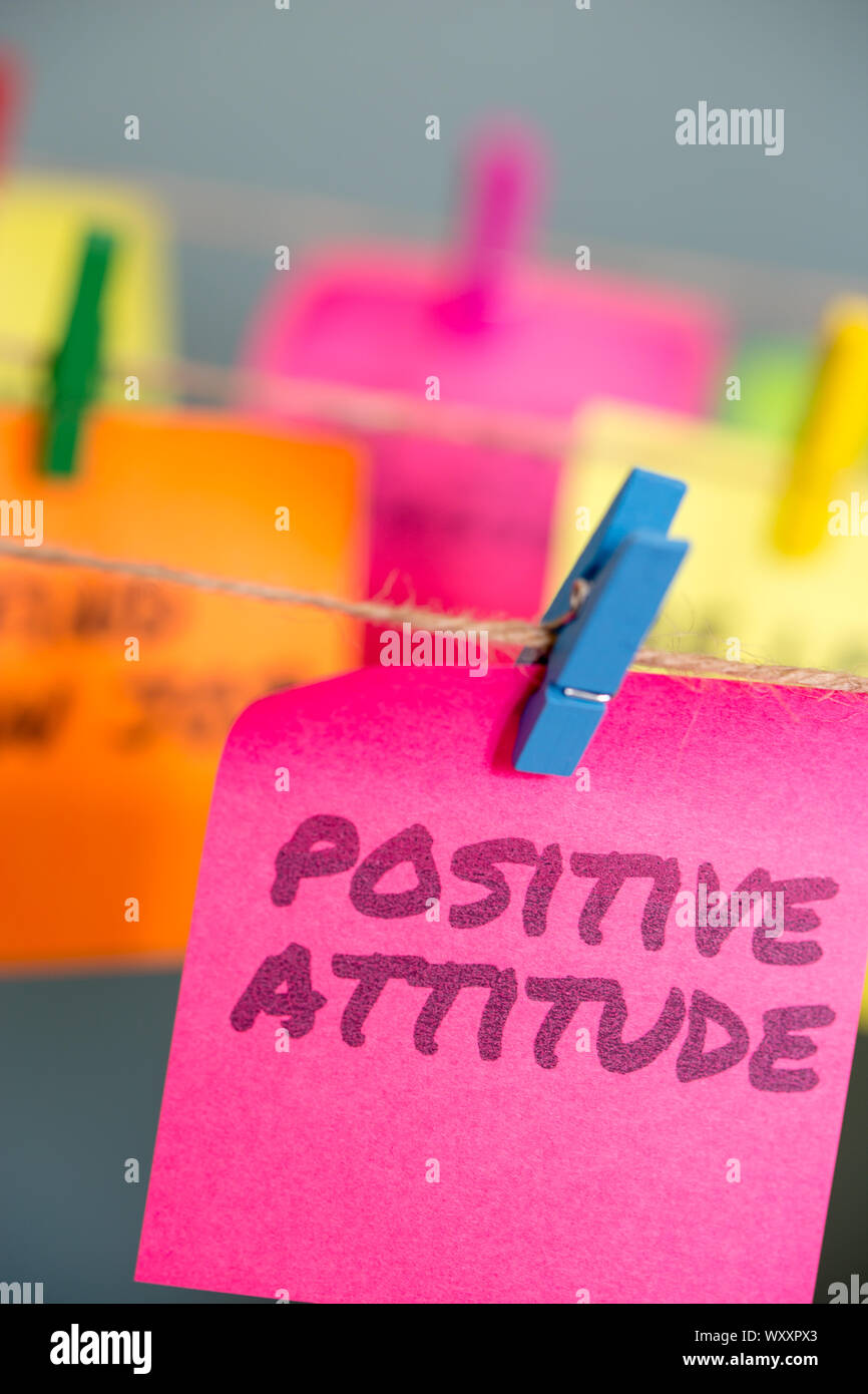 A set of colorful sticky notes with positive affirmation words and ...