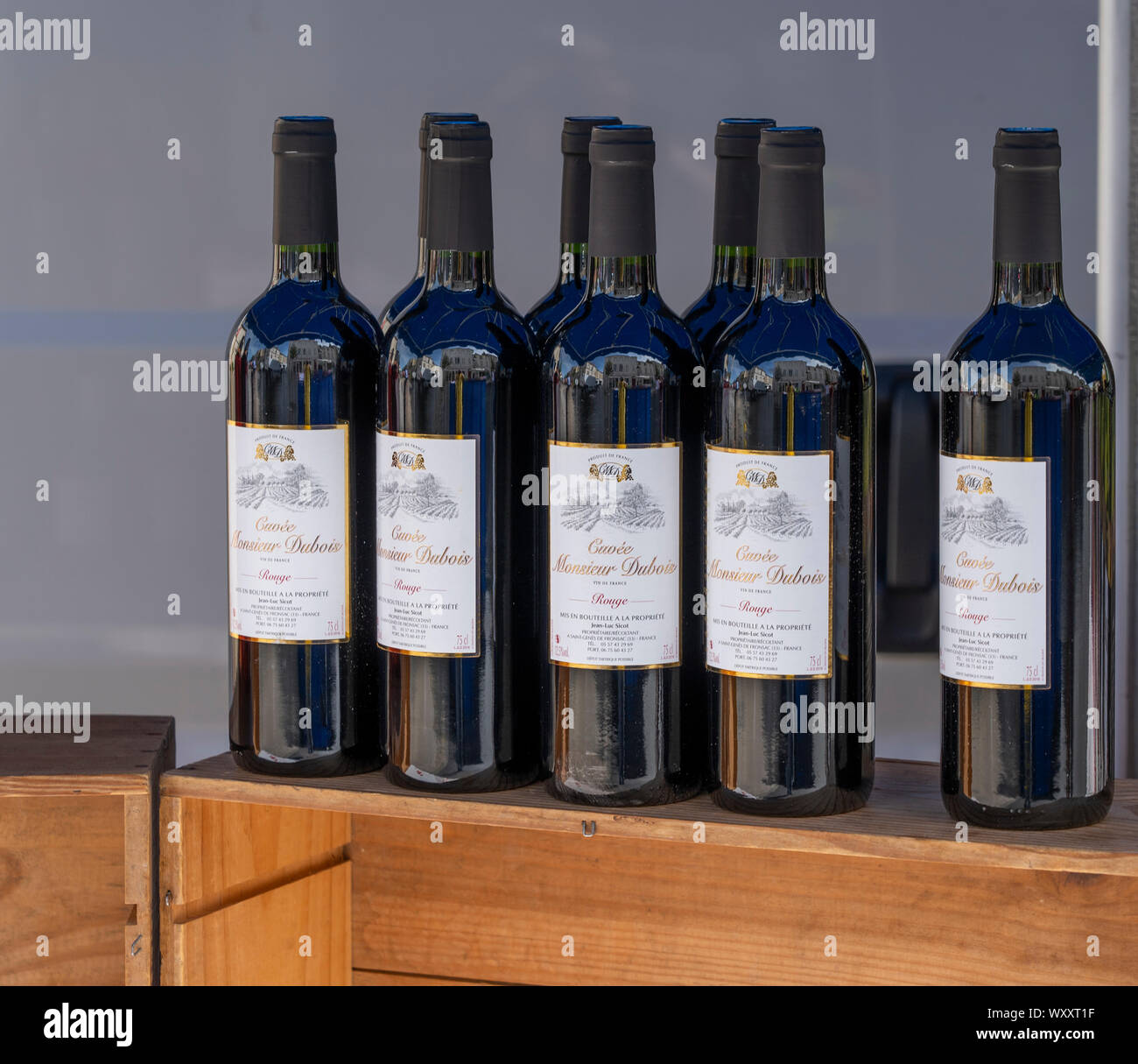 Red Bottles of Wine Stock Photo - Alamy
