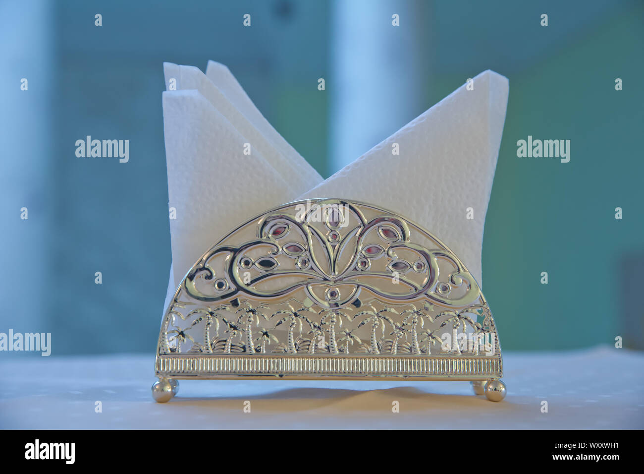 blur image - White paper napkin is placed in a glass on the table in ...