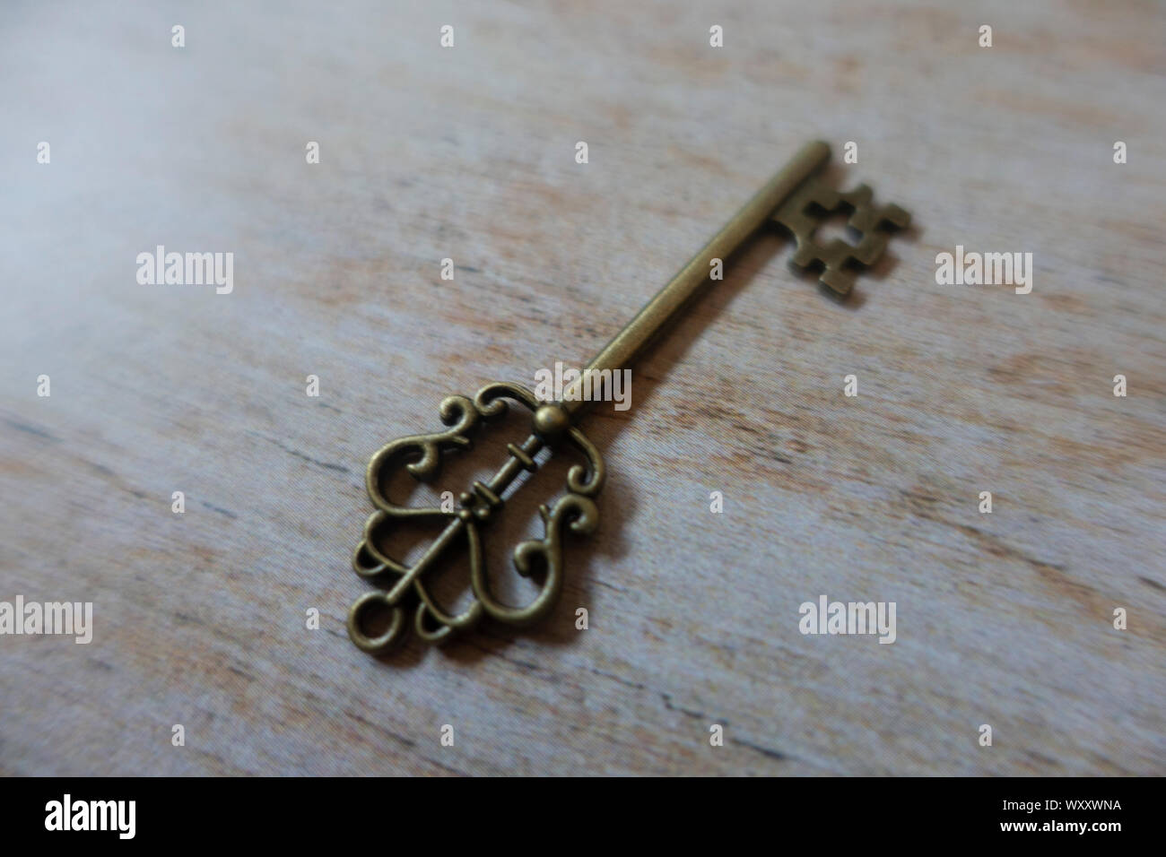The old golden key of some lock, Spain Stock Photo - Alamy