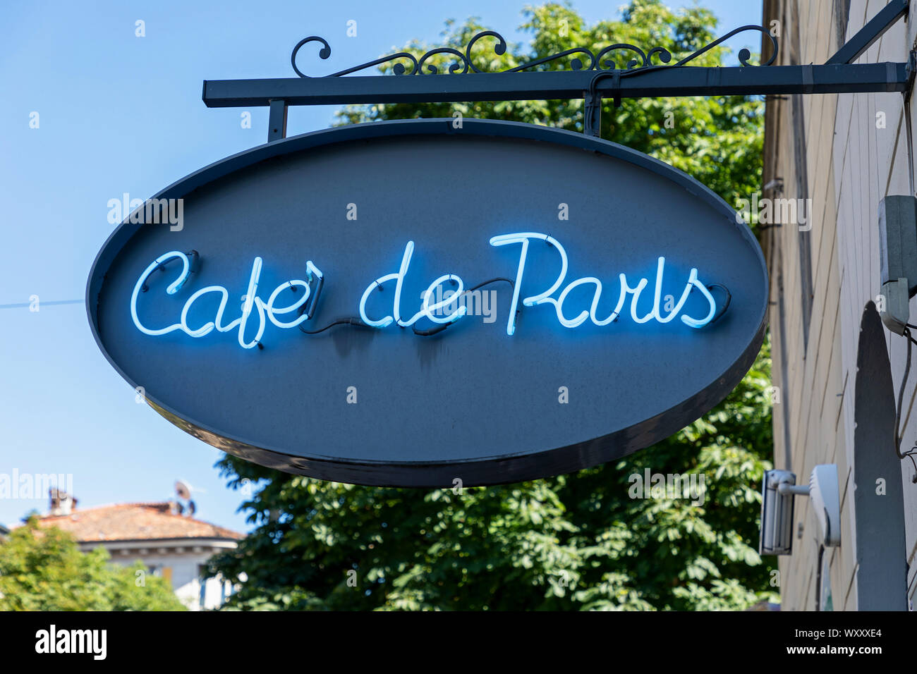Blue Neon Oval Sign Cafe de Paris Stock Photo - Alamy