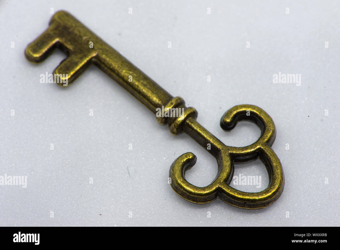 The old golden key of some lock, Spain Stock Photo - Alamy