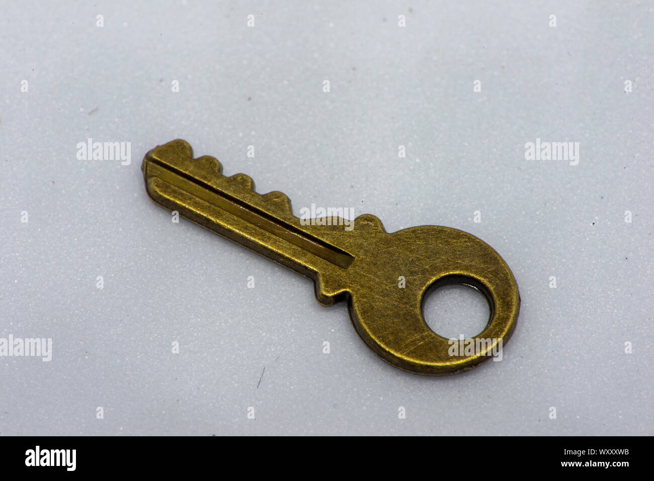 The old golden key of some lock, Spain Stock Photo - Alamy