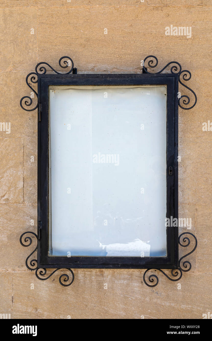 Empty Glass Information Board Frame at Wall Stock Photo - Alamy