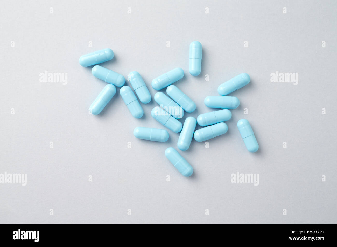 Calcium capsules. Bright background. Top view. Close up. Copy space ...
