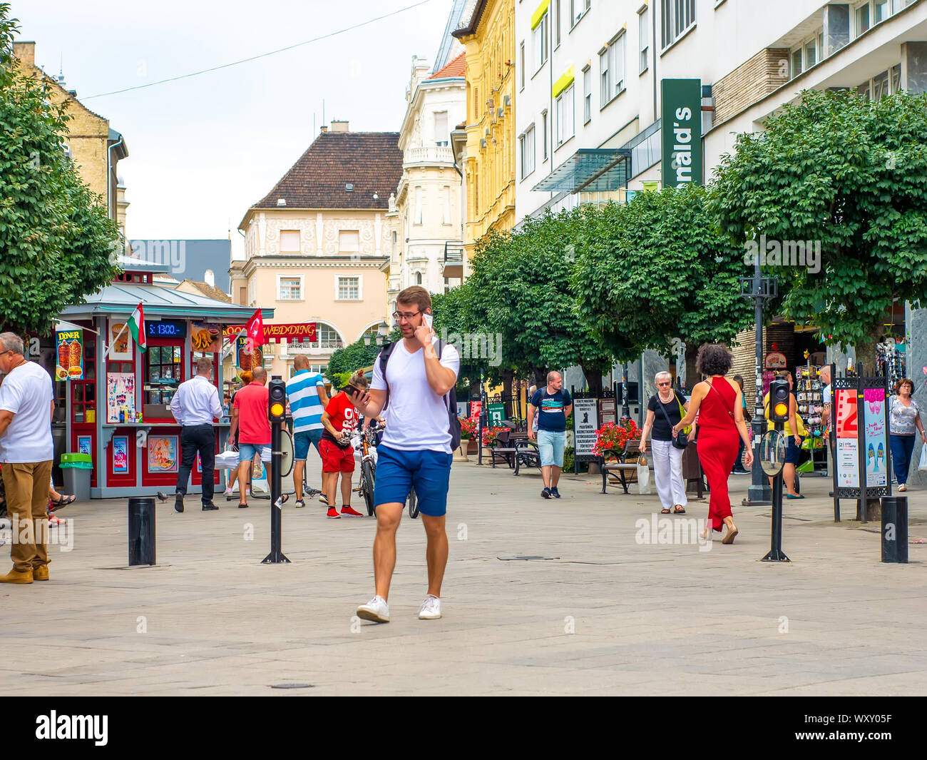 View on the people walking on the Baross Gabor street in Gyor, Hungary ...