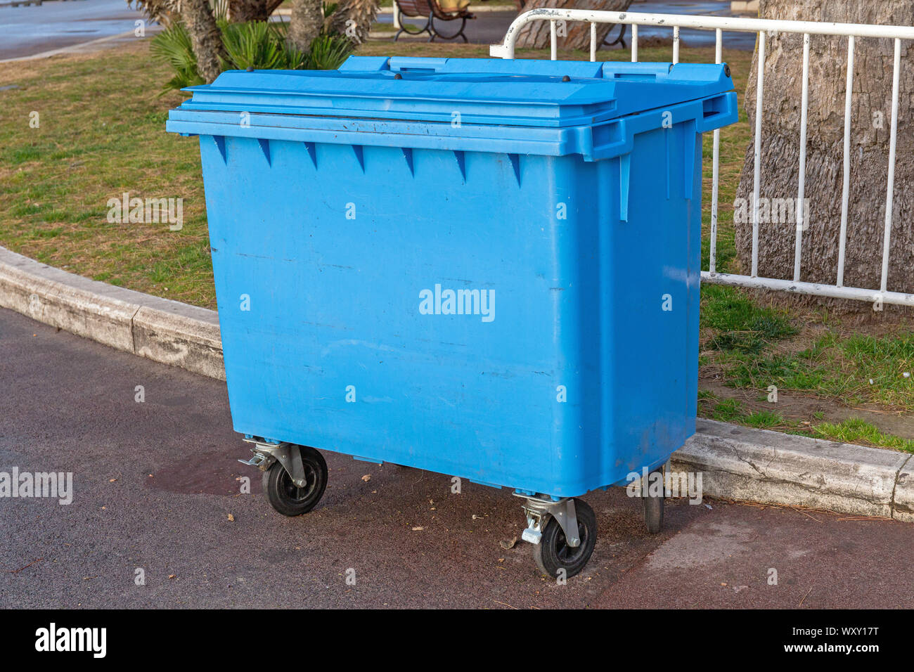 Big Blue Plastic Recycling Bin in Cannes Stock Photo - Alamy