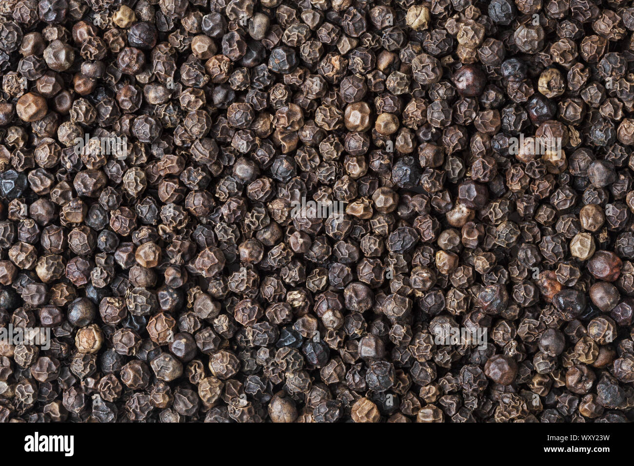 Black pepper corn background Stock Photo - Alamy