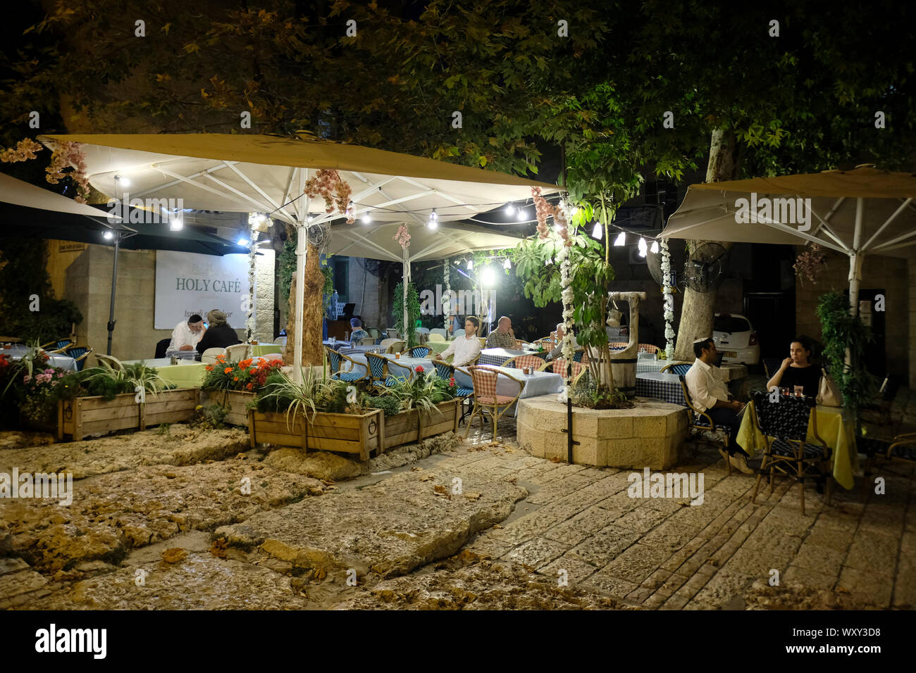 People sitting in a coffee house in Hurva square at the Jewish Quarter ...