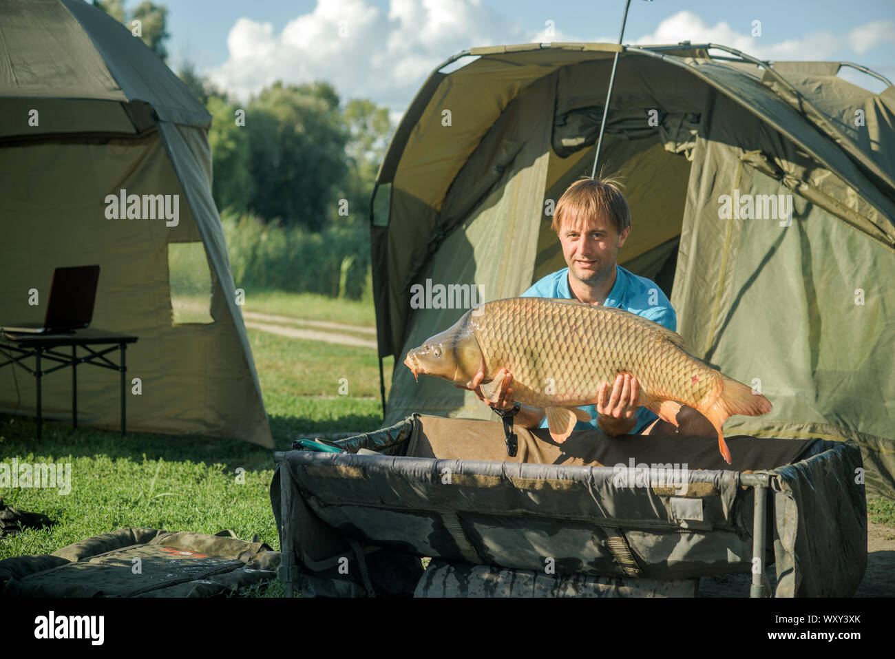 Male angler holding big hi-res stock photography and images - Alamy