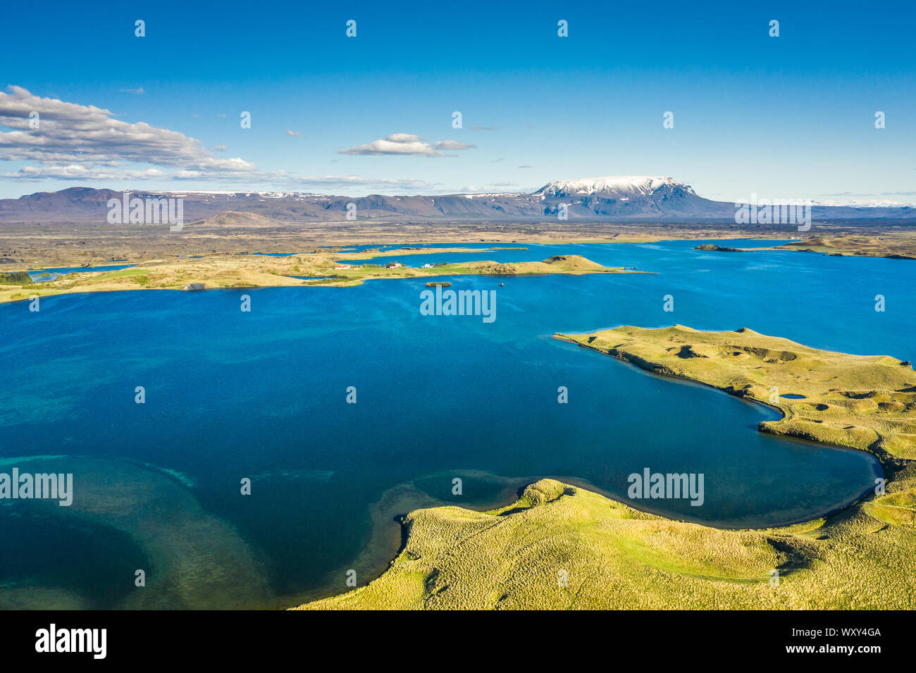 Landscape of Lake Myvatn with green pseudocraters and islands at ...