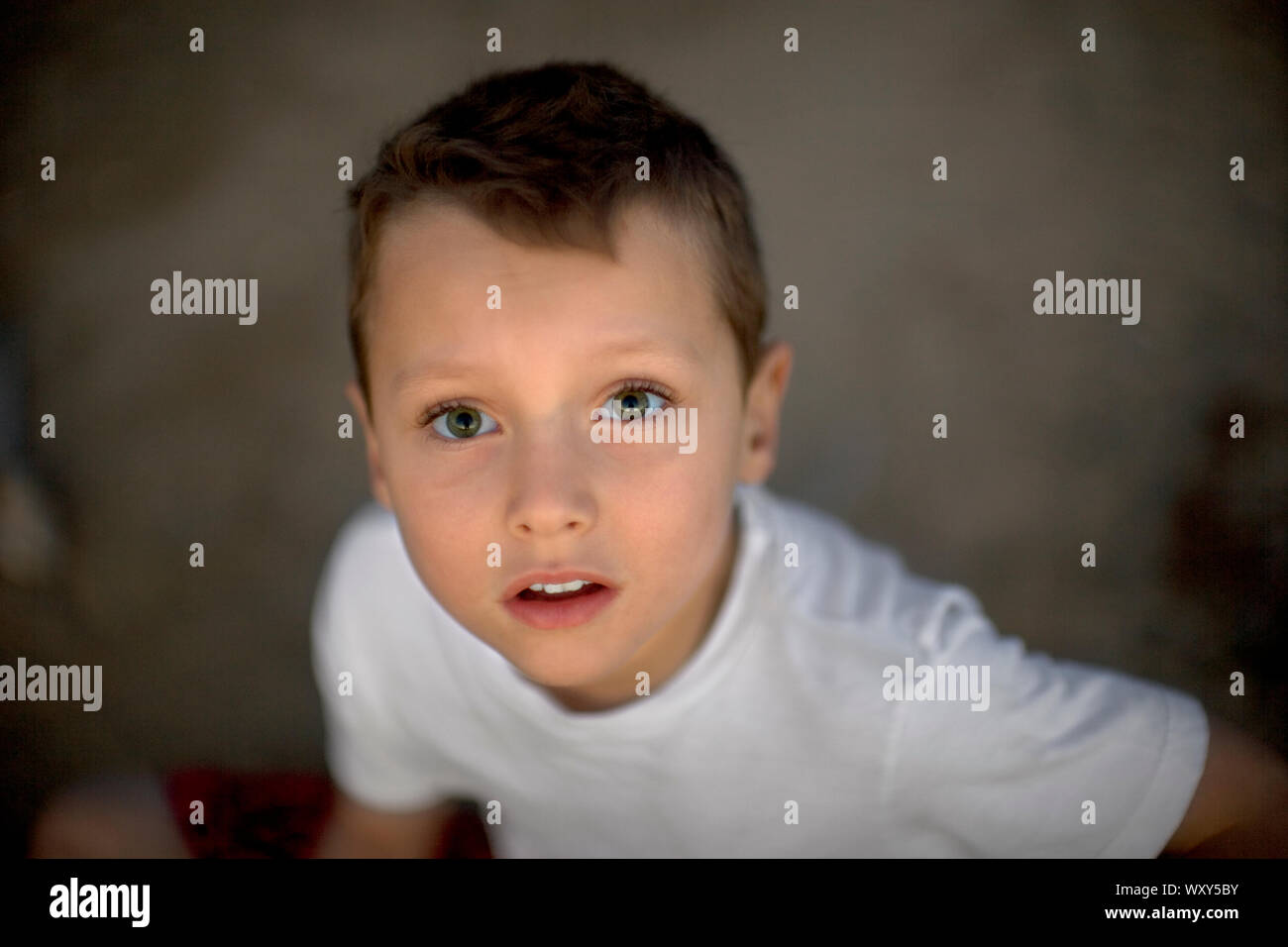 Boy with confused look on face Stock Photo - Alamy