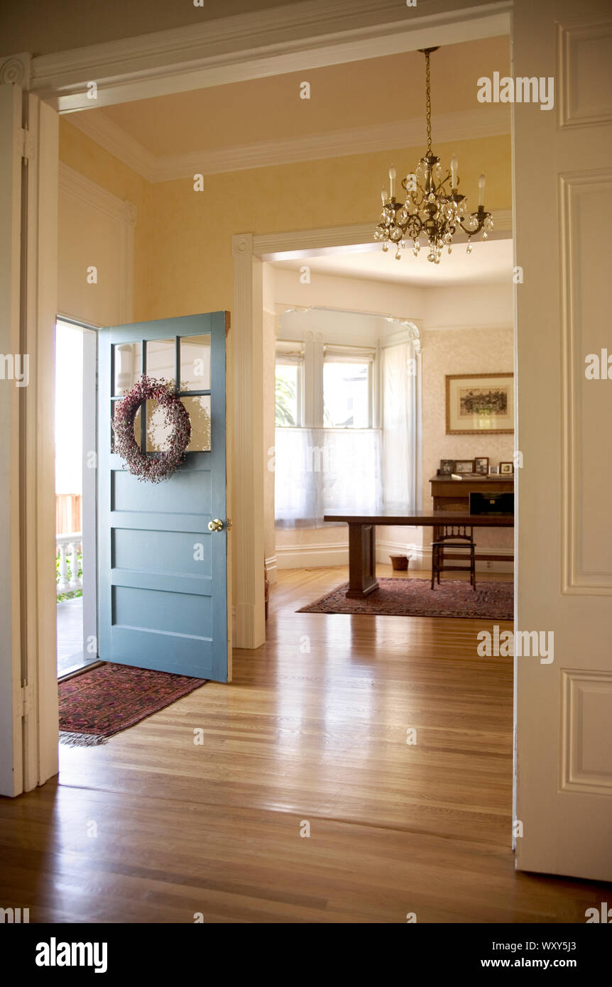 Entryway with open door Stock Photo - Alamy
