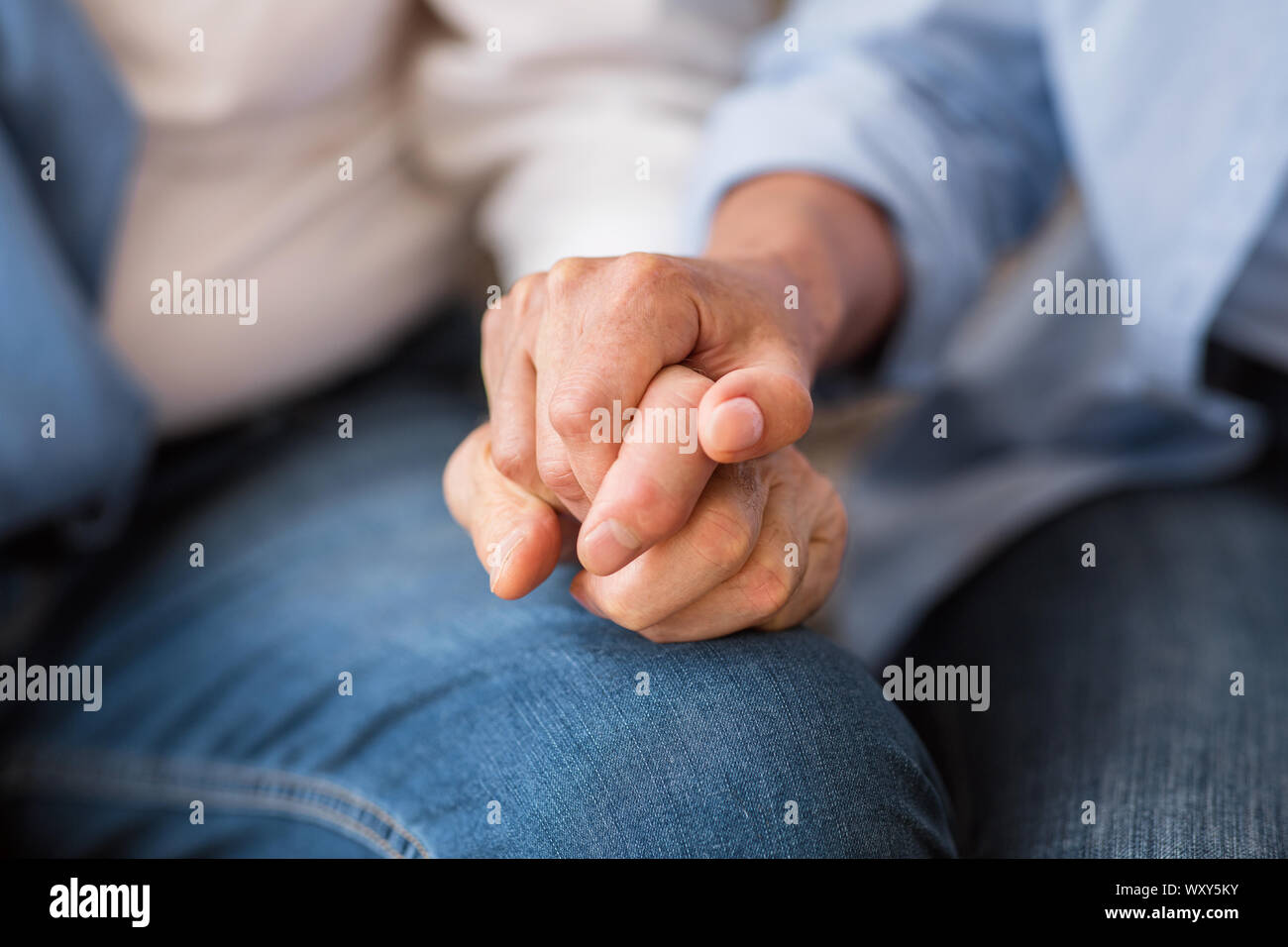 Love and support concept. Senior couple tenderly holding hands Stock ...