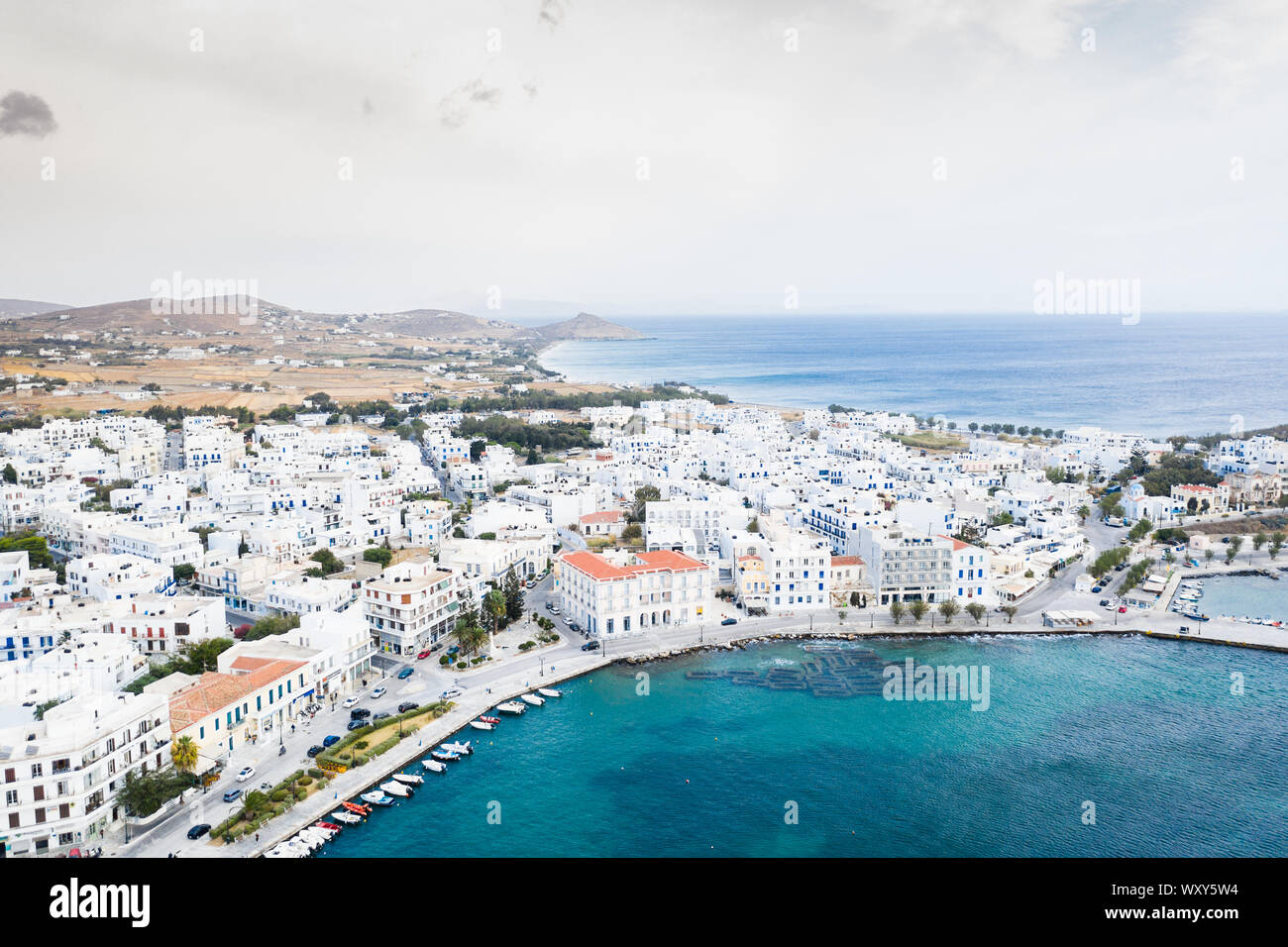 Aerial view of Tinos' port during a cloudy day Stock Photo - Alamy