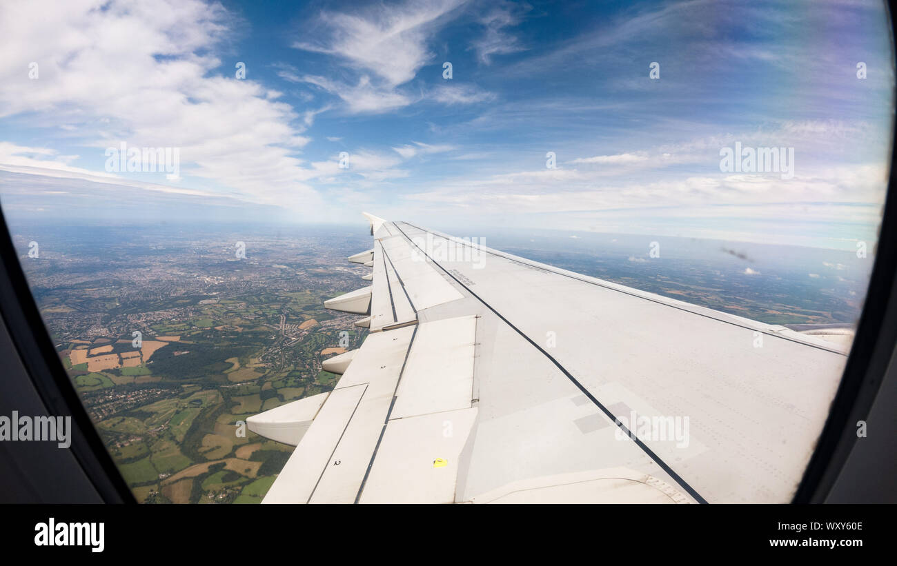 View from the window of the aircraft on the wing Stock Photo - Alamy