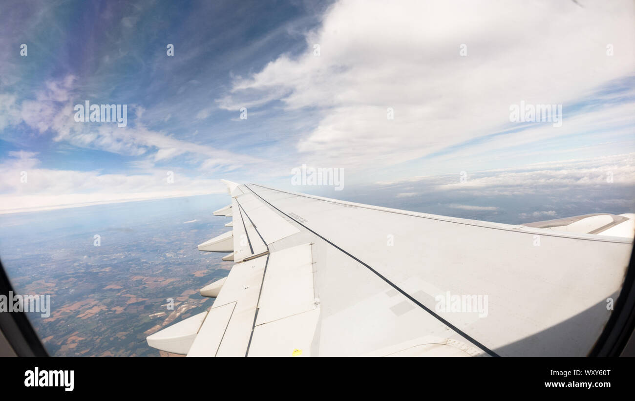 View from the window of the aircraft on the wing Stock Photo - Alamy