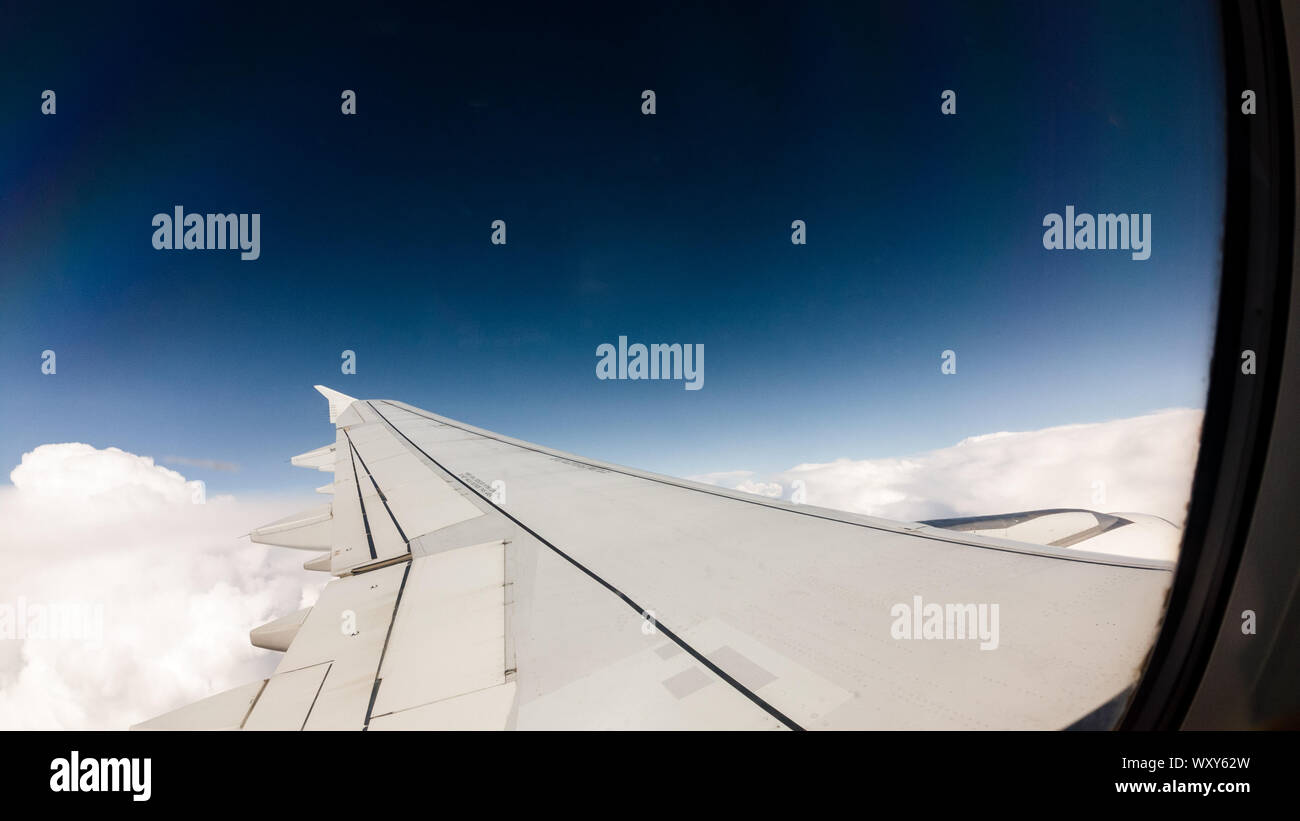 View from the window of the aircraft on the wing Stock Photo - Alamy