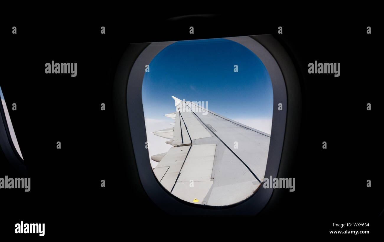 View from the window of the aircraft on the wing Stock Photo - Alamy