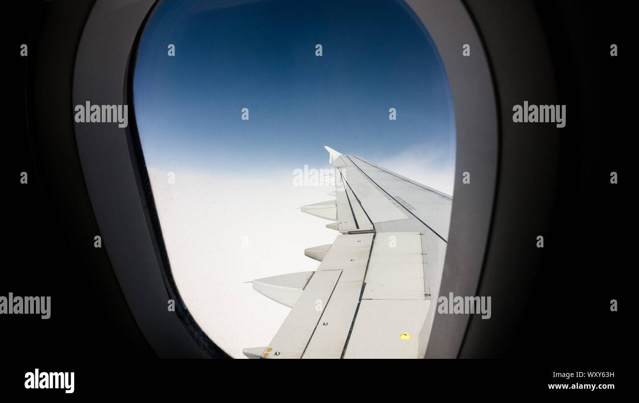 View from the window of the aircraft on the wing Stock Photo - Alamy