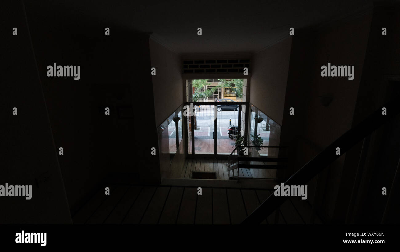 Street view from the inside of a typical residential building in Athens ...