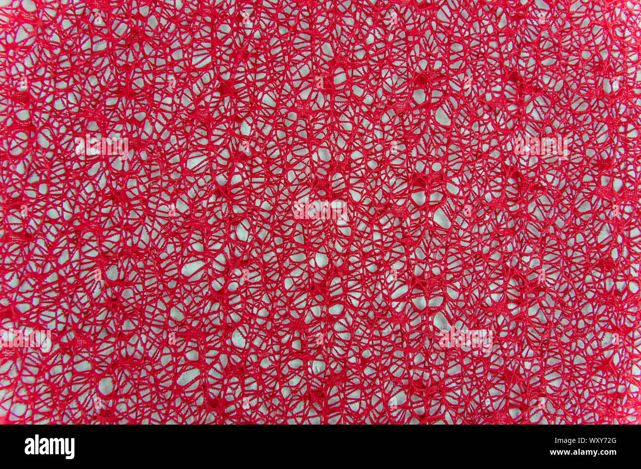 red mesh background on a white background Stock Photo - Alamy