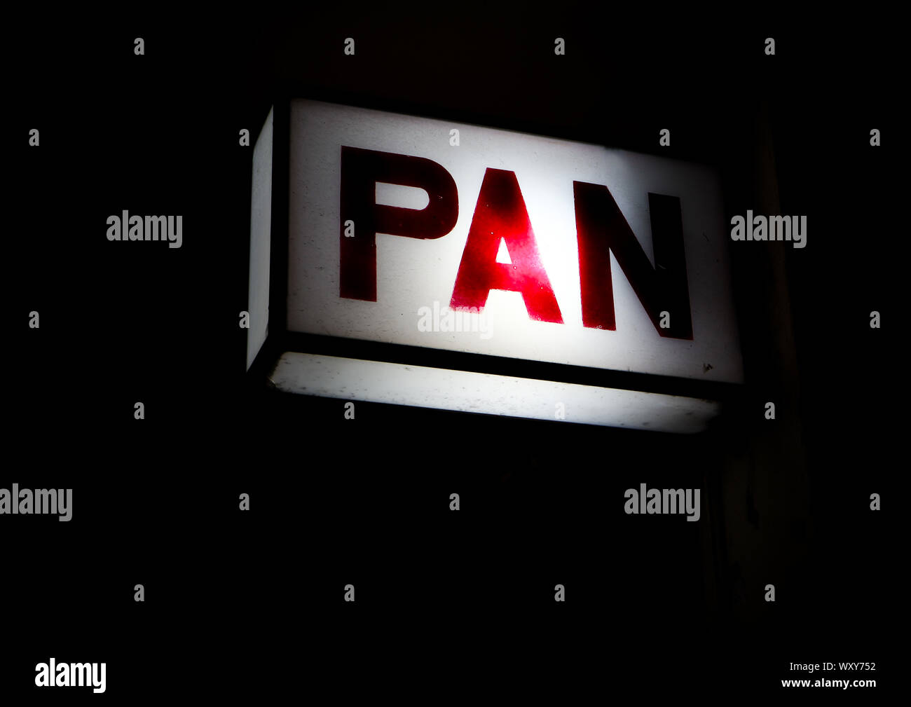 Sign for Bakery Lit up At Night in Mexico City (Sign Translates "Pan ...