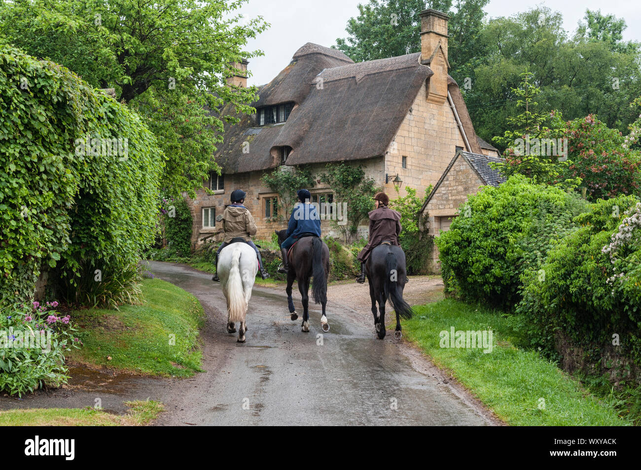 STANTON, ENGLAND - MAY, 26 2018: Unidentifed people and horses near ...