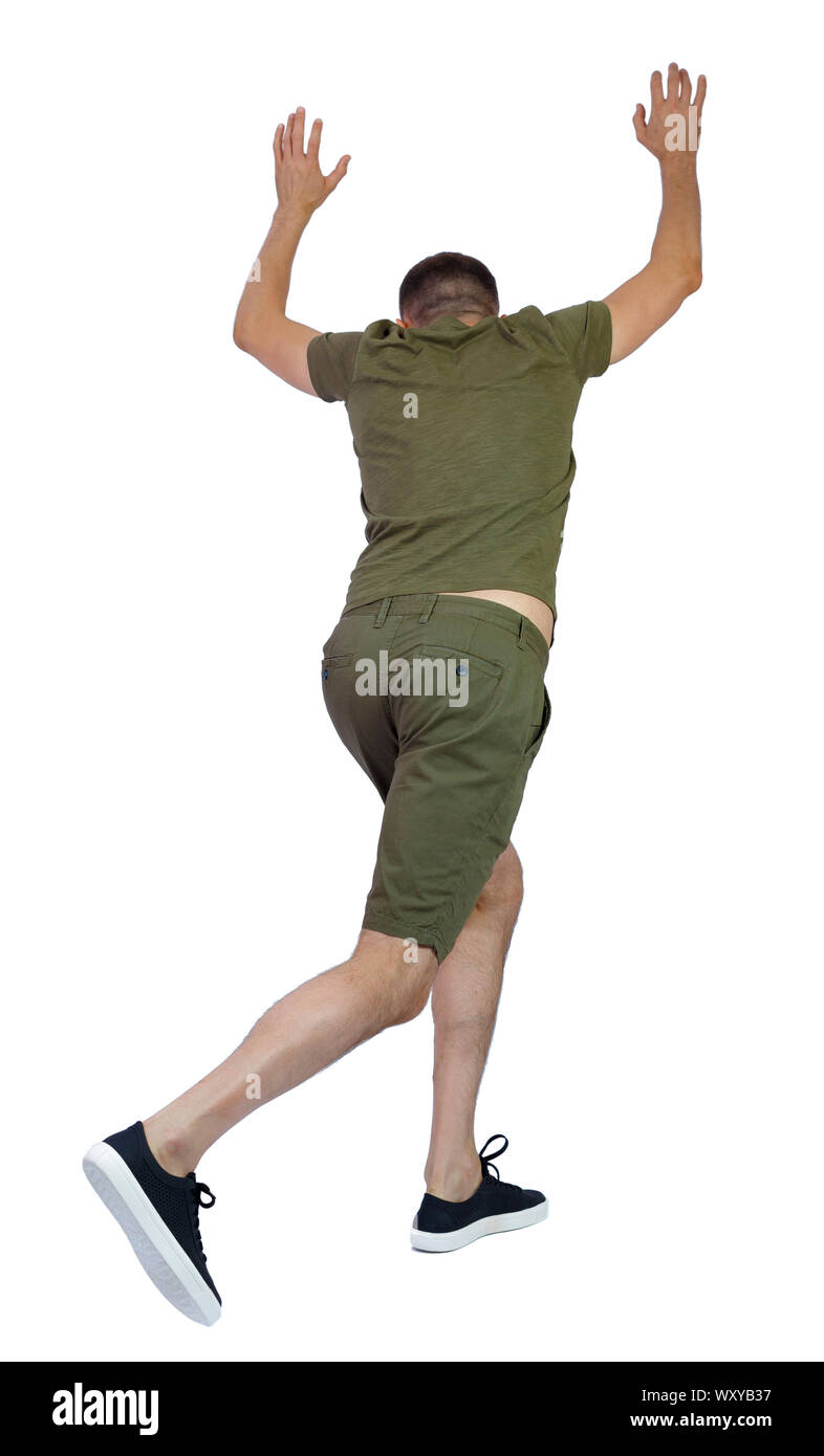 back view of running man in shorts. backside view of person. Rear view ...