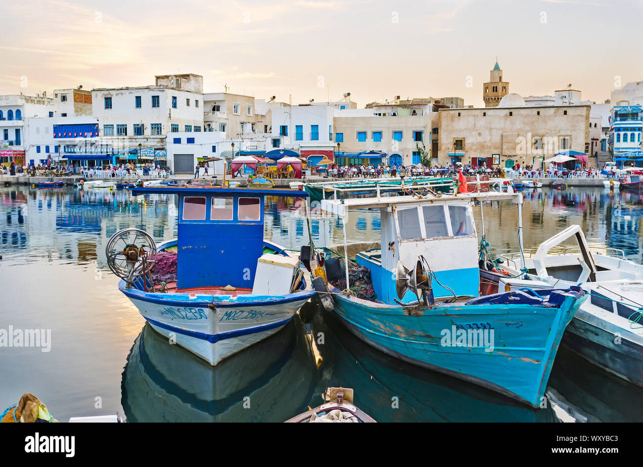 BIZERTE, TUNISIA - SEPTEMBER 4, 2015: The moored boats in old port with ...