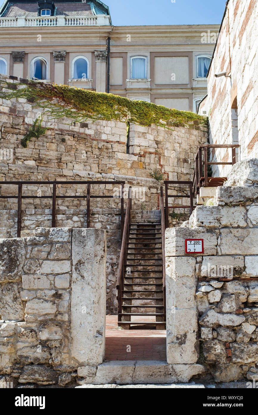 Medieval stone wall and Buda castle in Budapest, layers of architecture ...