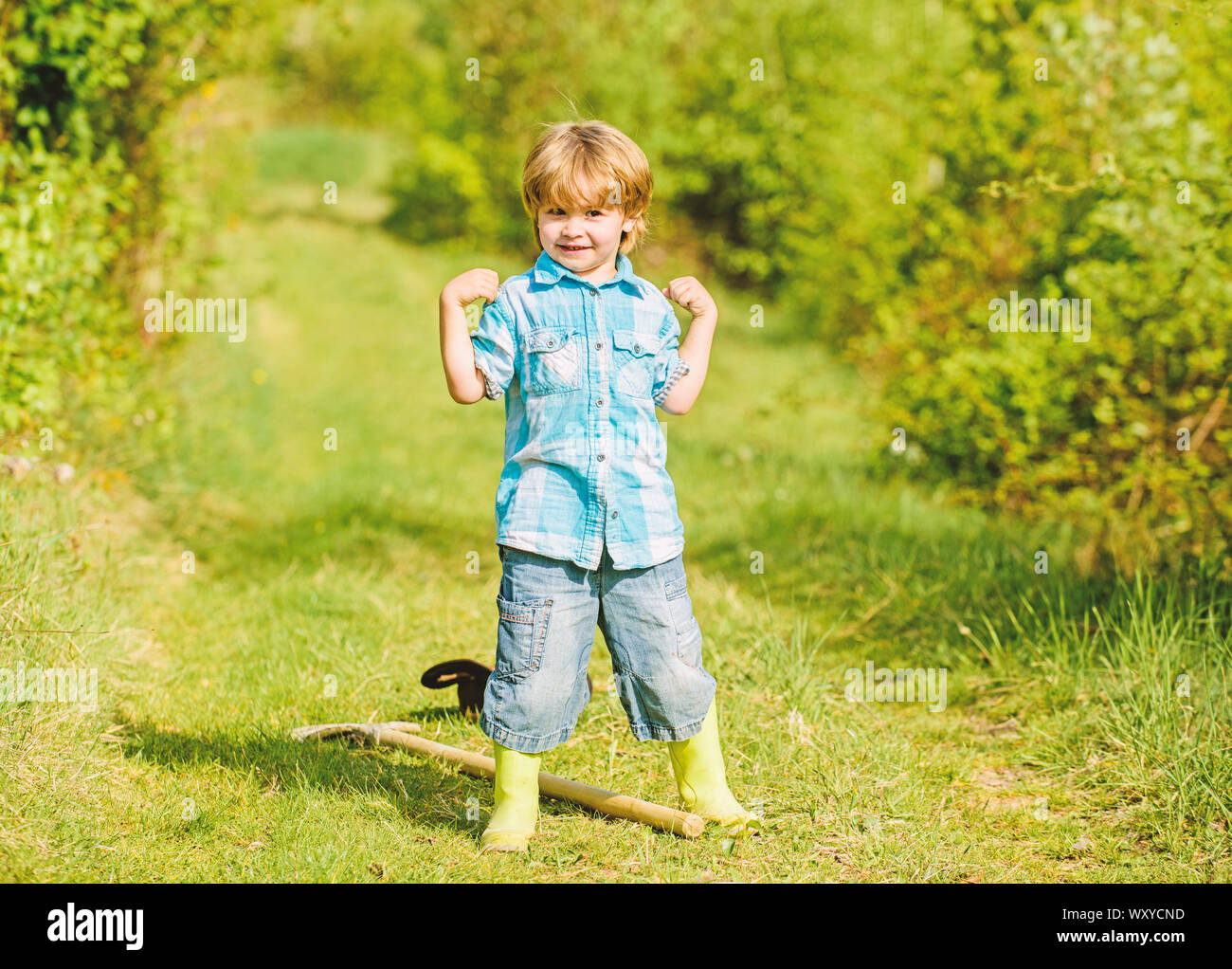 small kid gardener having fun. human and nature. farming and ...