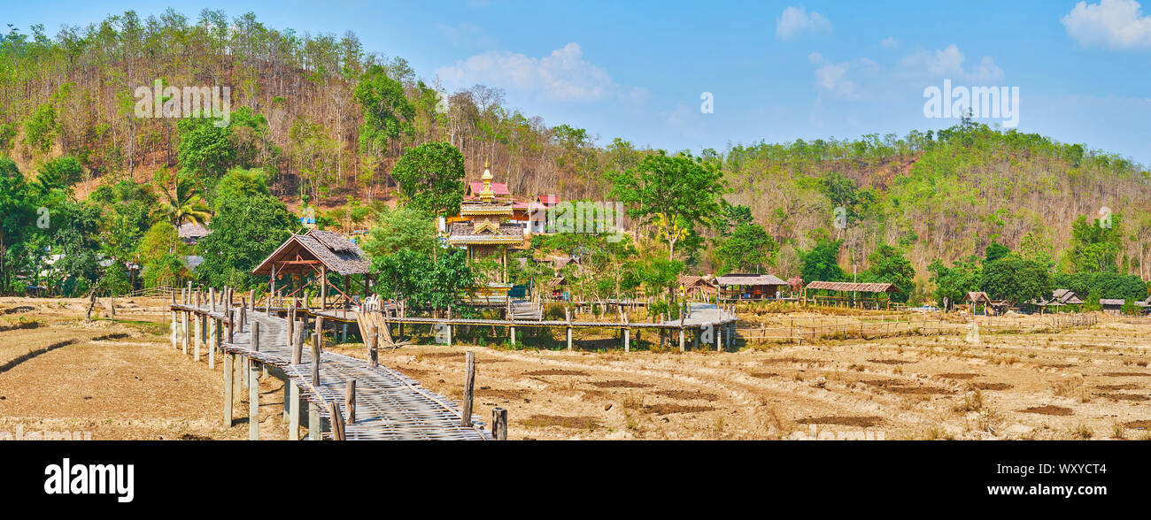 Panorama of mountain scenery of Pai suburb with dried paddy field and ...