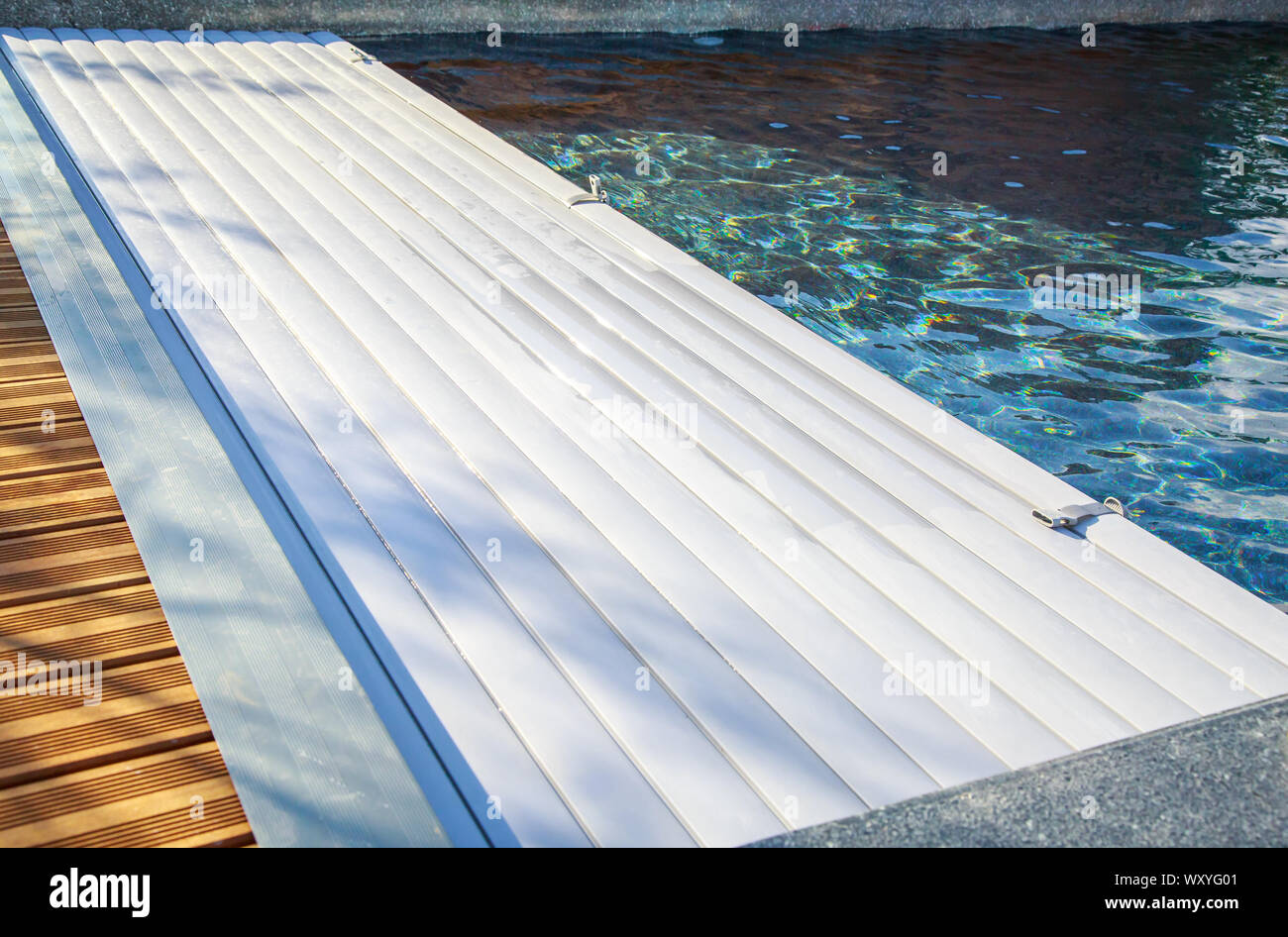 Retractable pool cover hi-res stock photography and images - Alamy