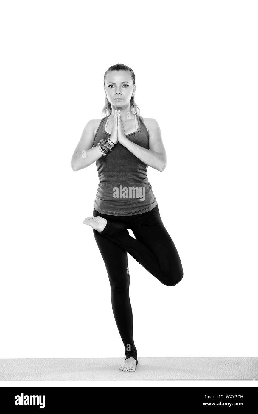 Woman yoga teacher in various poses (asana) isolated on white ...